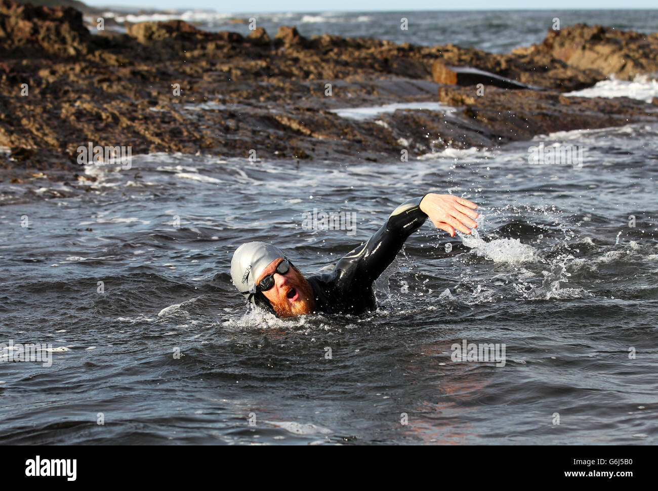 Man becomes first to swim UK length Stock Photo - Alamy