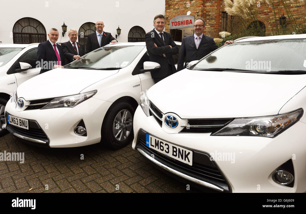 Staff at Toshiba in Chertsey, Surrey with some of their new fleet of ...