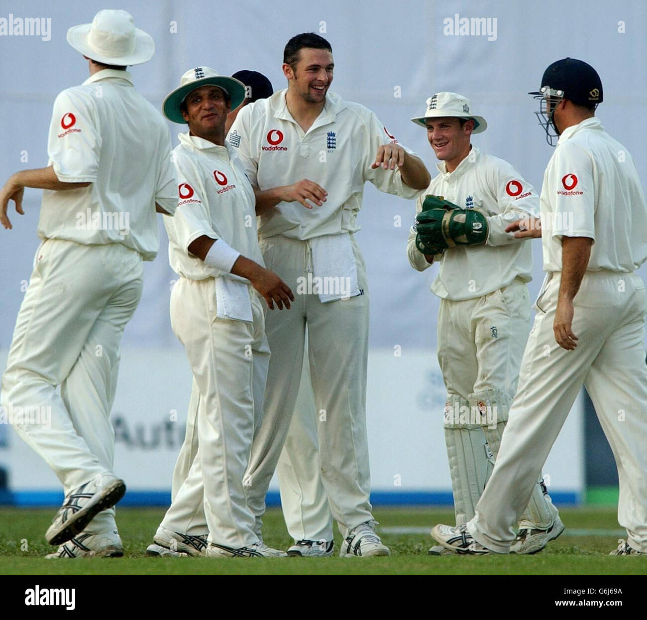 England bowler Stephan Harmison (centre) celebrates a wicket with team ...