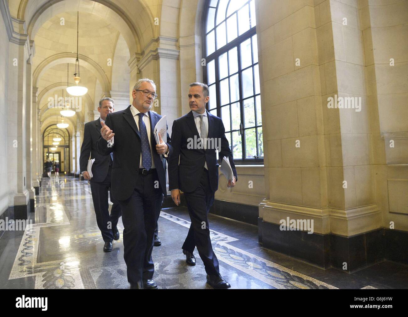 Bank of England Governor Mark Carney (right) speaks with Deputy ...