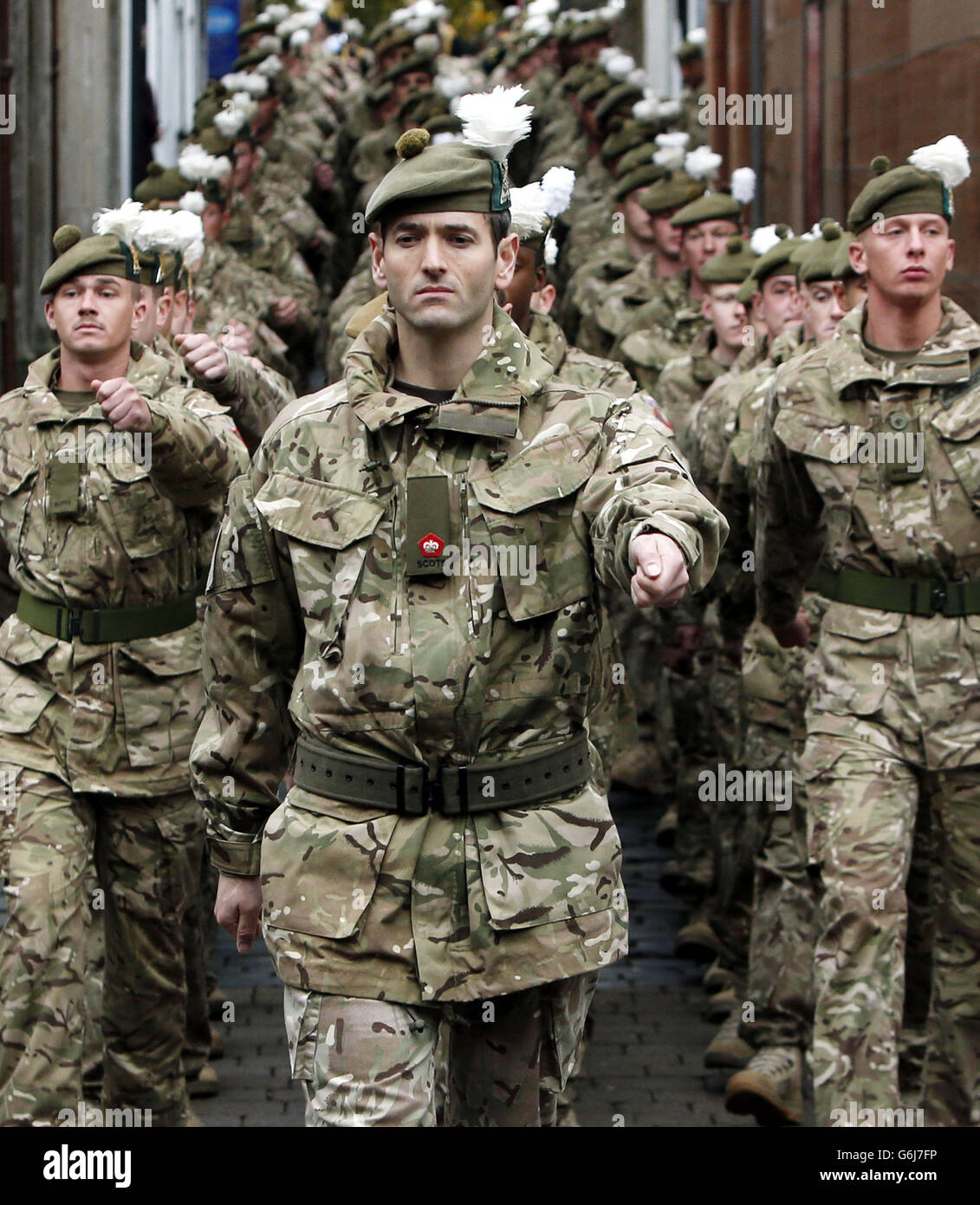 Around 400 members of 2 Scots march through Ayr town centre in Scotland ...