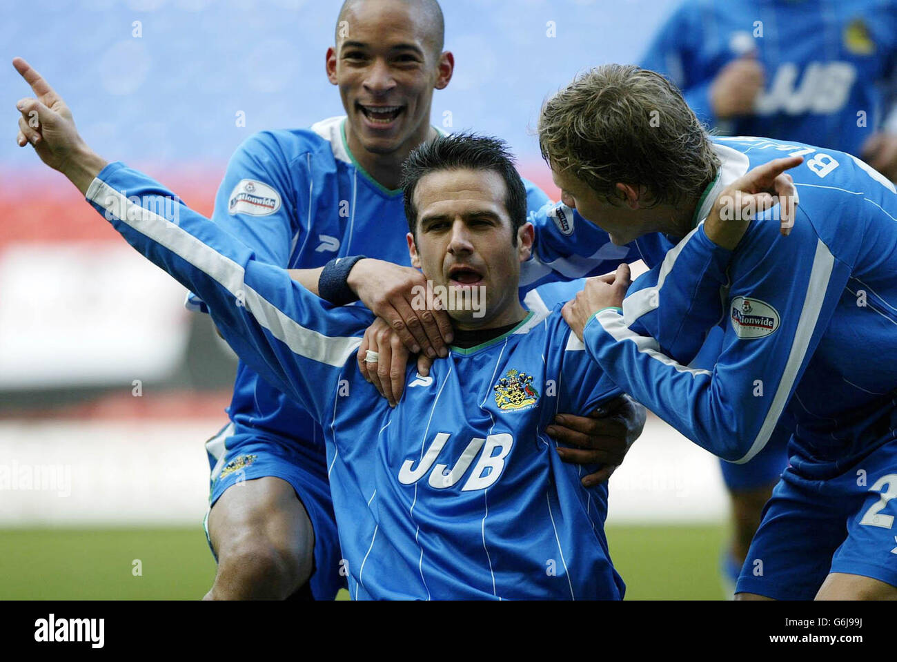 Wigan's Andy Liddell (C) celebrates his opening goal against Crystal ...