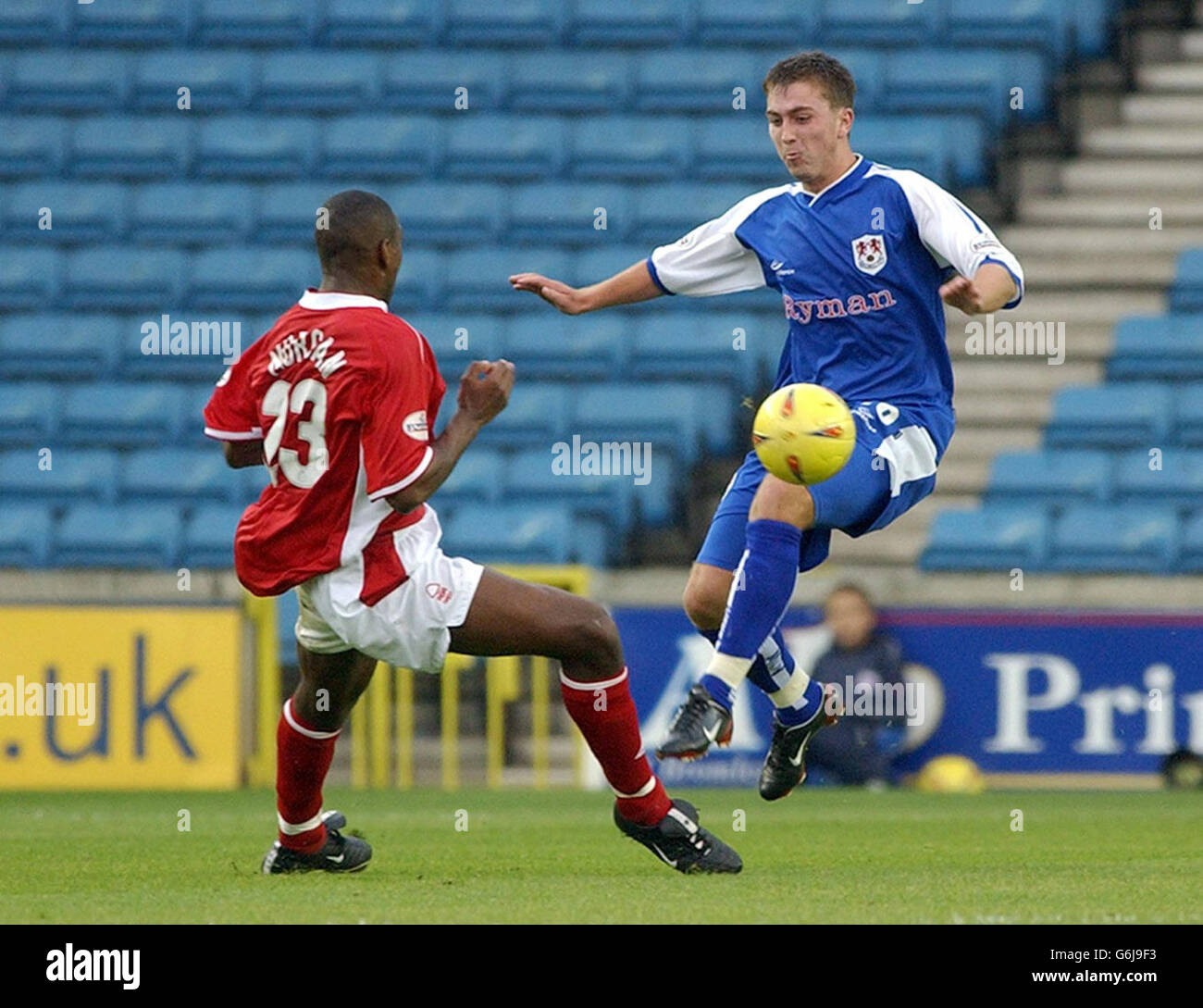 Millwall's Peter Sweeney (right) and Nottingham Forest's Wes Morgan in ...