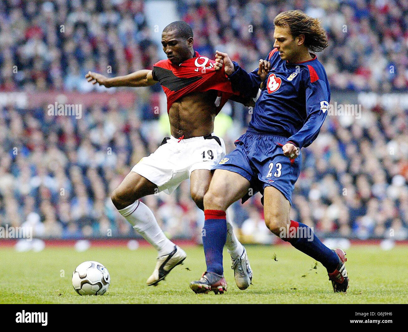 Shirt pulling football utd hi-res stock photography and images - Alamy