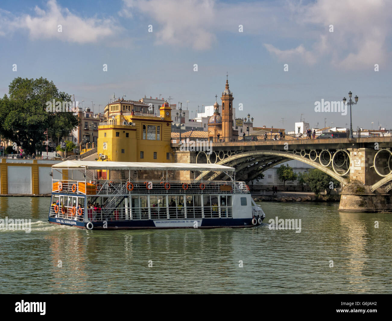 SEVILLE, SPAIN - MARCH 15, 2016: Sightseeing boat on the River ...