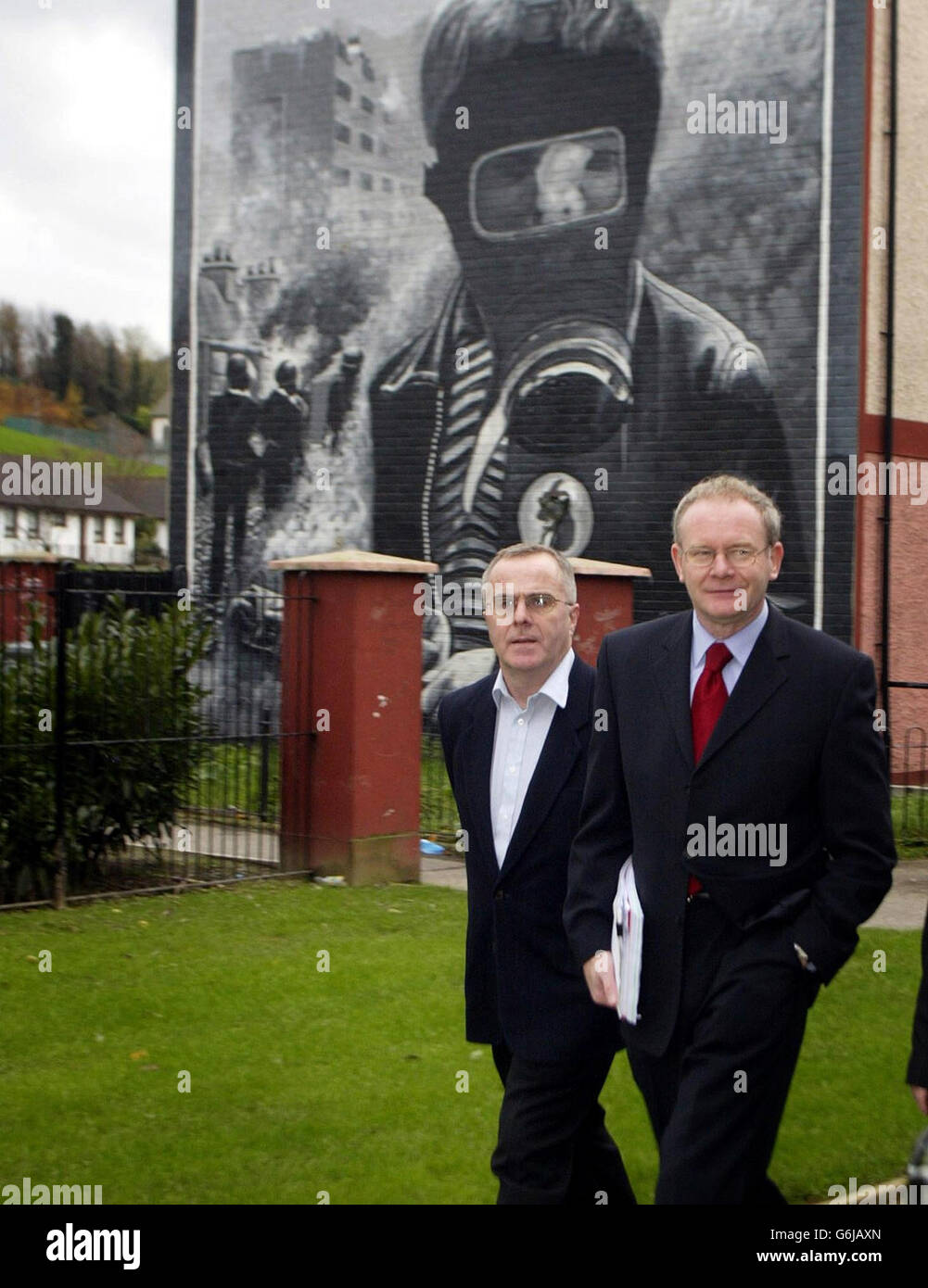 Martin McGuinness, with Londonderry Sinn Fein member Raymond McCartney ...
