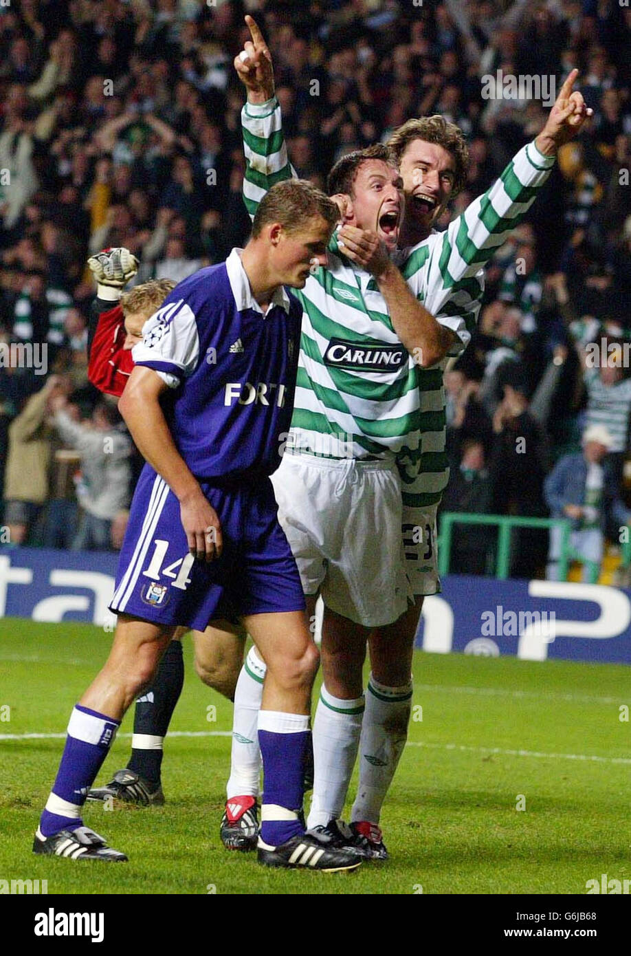 Chris Sutton (centre) celebrating his goal with team mate Stanislav ...