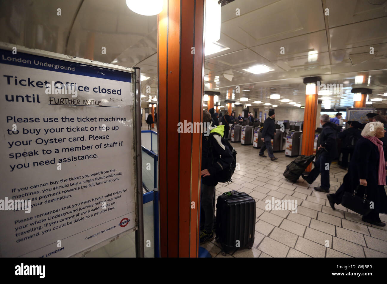 A general view of a ticket office closure sign at Piccadilly Circus ...