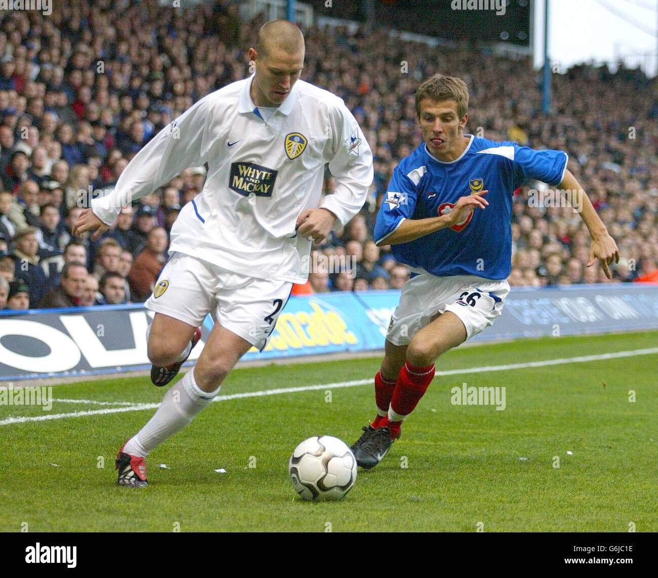 Gary O'Neil of Portsmouth chases Seth Johnson of Leeds United, during ...