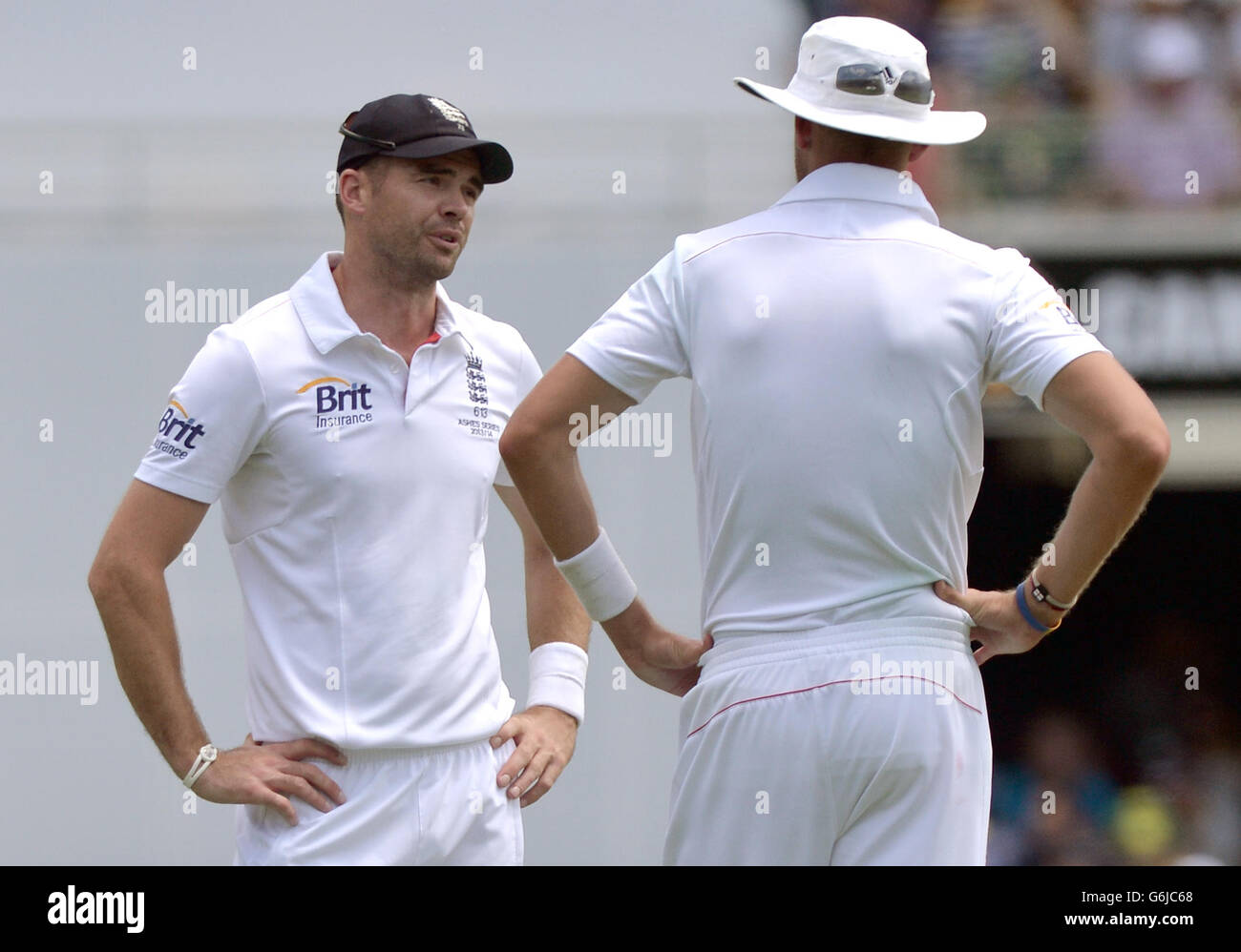 England's James Anderson (left) speaks with Stuart Broad (right) during ...