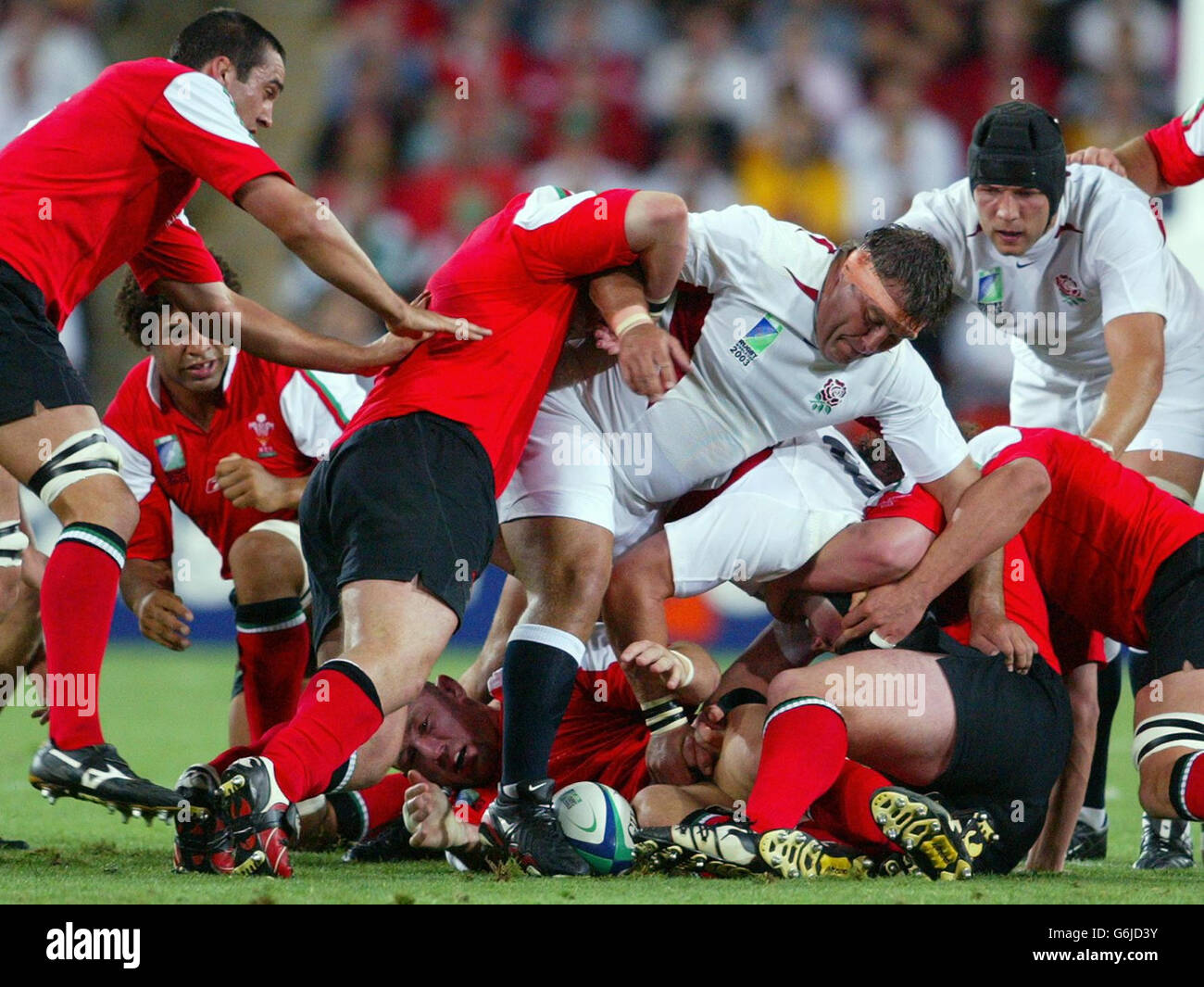 England's Jason Leonard rucks for the ball against Wales during their ...