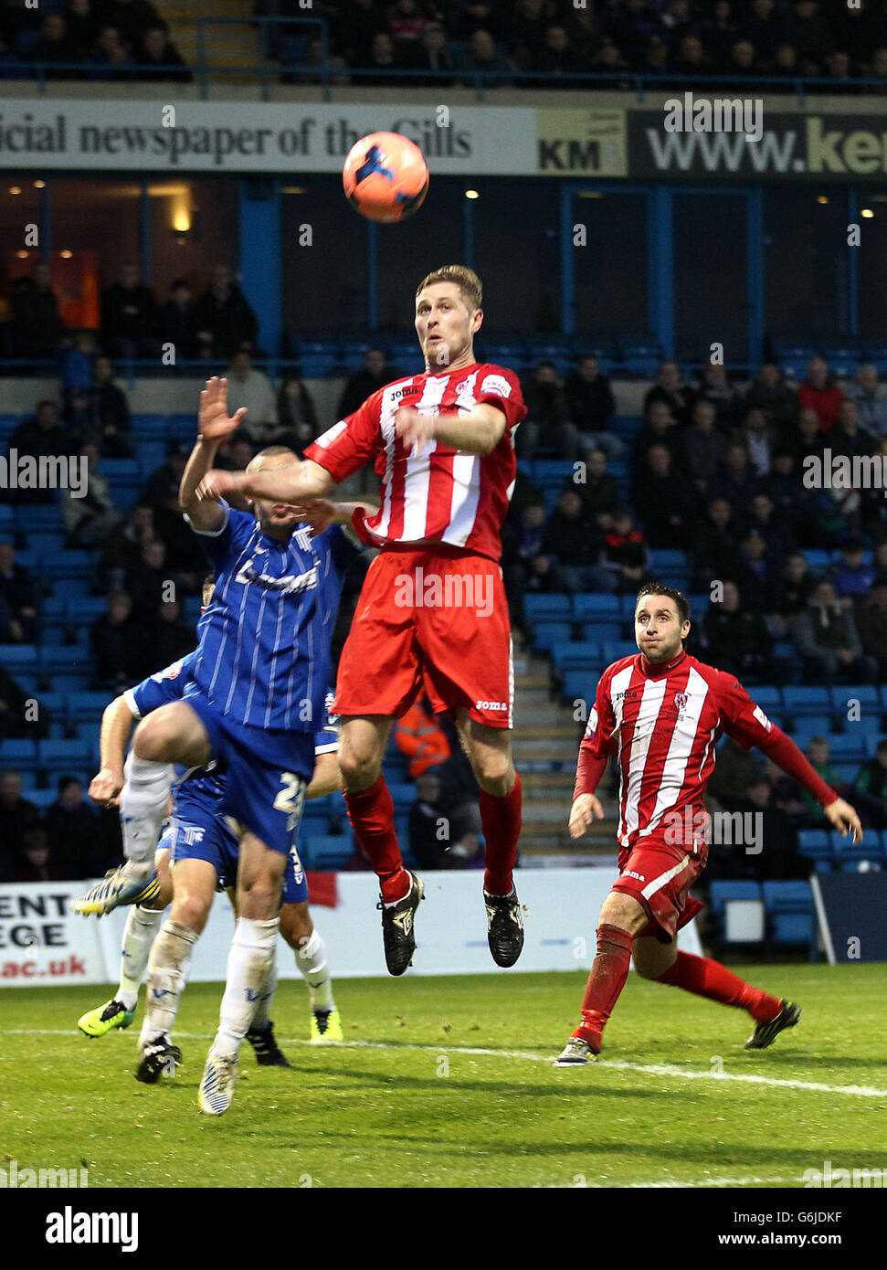 Brackley's Gary Mulligan heads towards goal before Gillingham score an ...