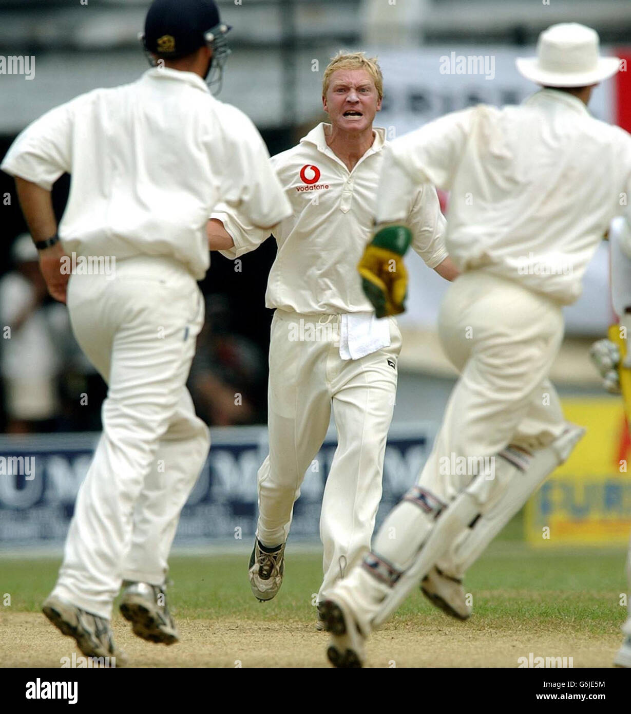 England spin bowler Gareth Batty (centre) celebrates after taking his ...