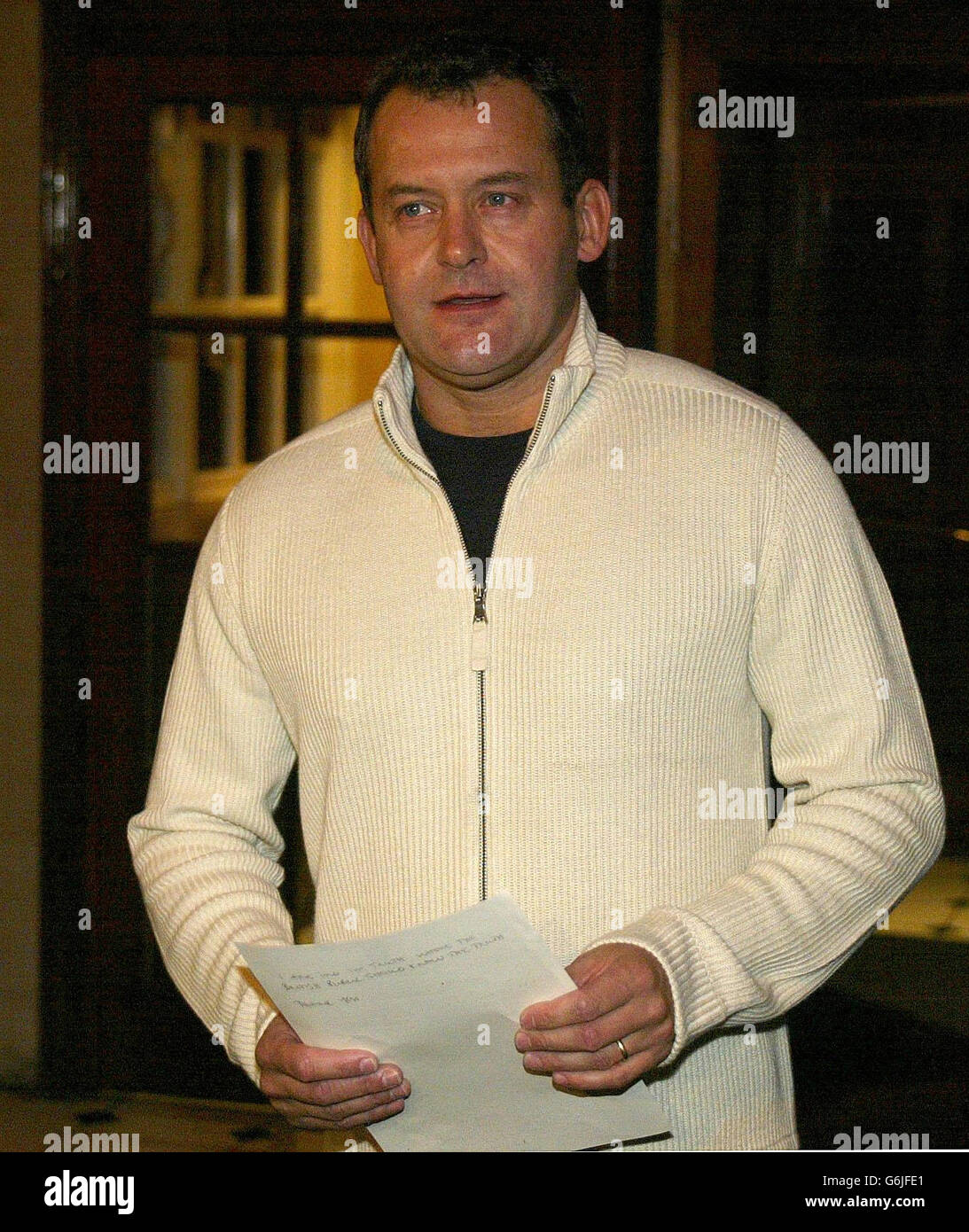 Paul Burrell reads a statement Stock Photo - Alamy