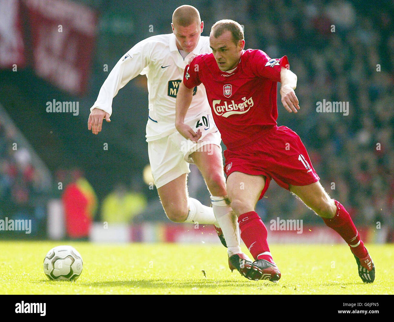 Liverpool's Danny Murphy (right) gets away from Leeds United's Seth ...
