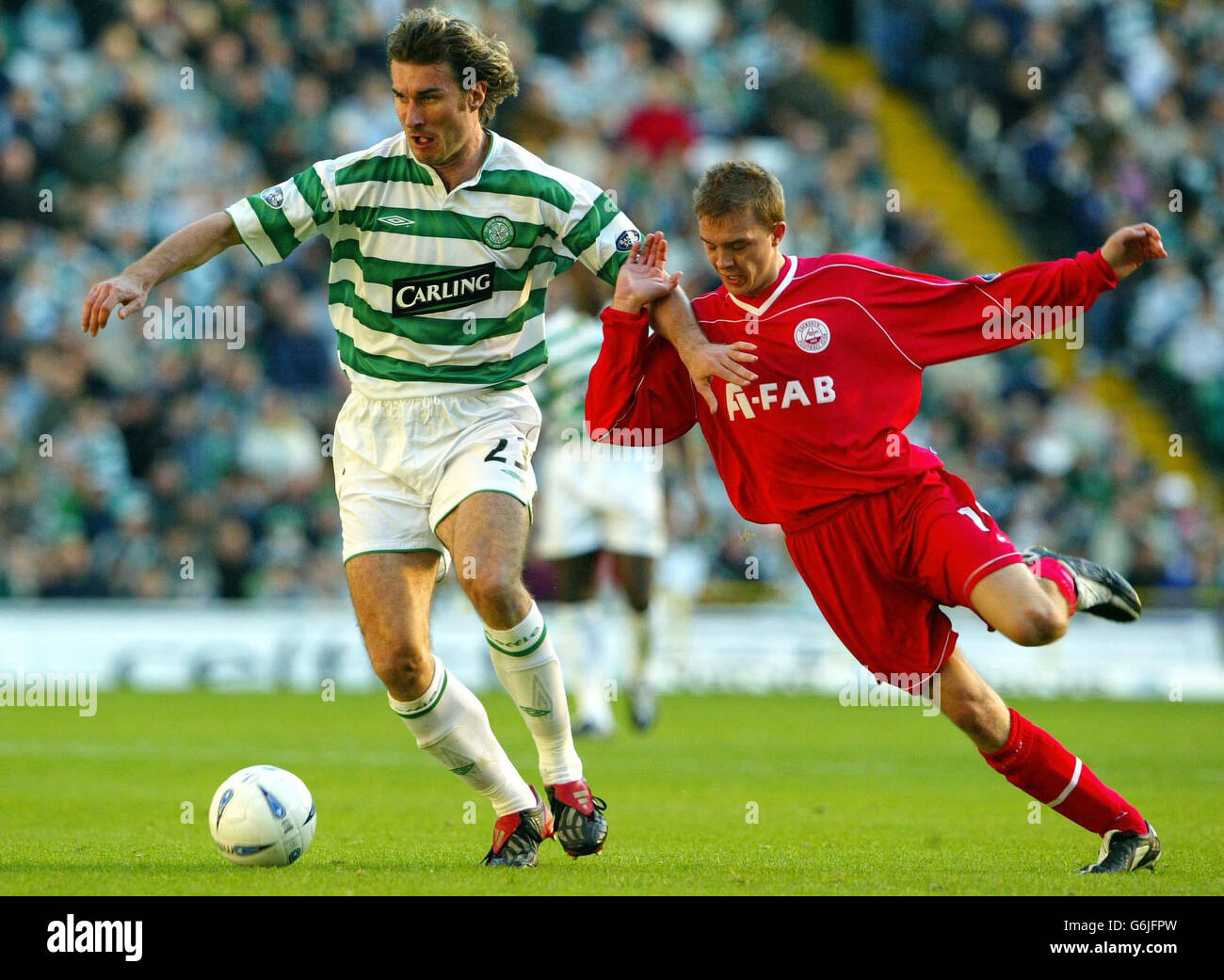 Celtic's Stanislav Varga (left) with Scott Muirhead, during their Bank ...