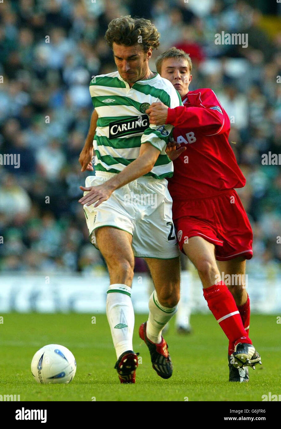 Celtic's Stanislav Varga (left) with Aberdeen's Scott Muirhead, during ...