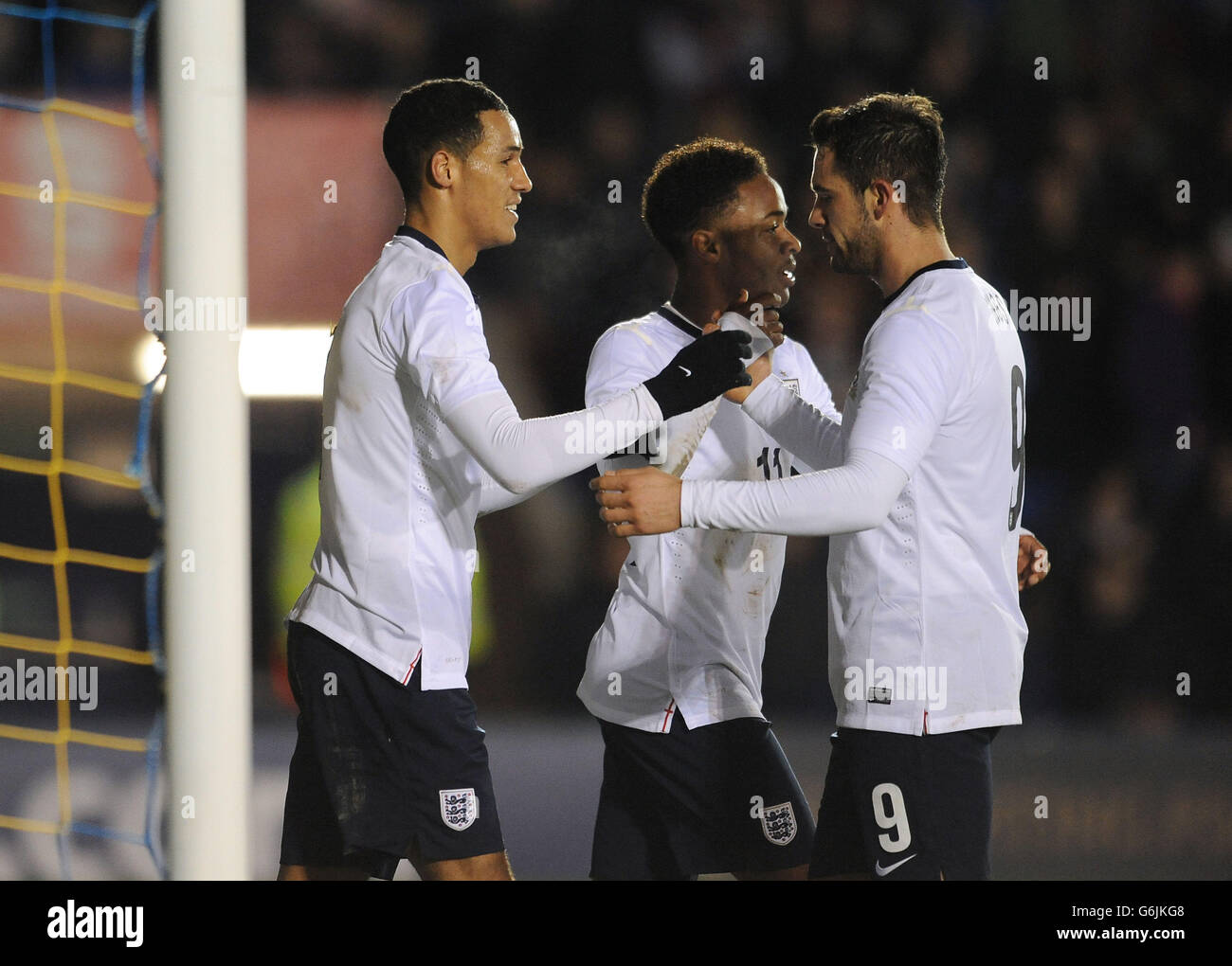 England's Tom Ince (left) celebrates scoring the fifth goal with Raheem ...