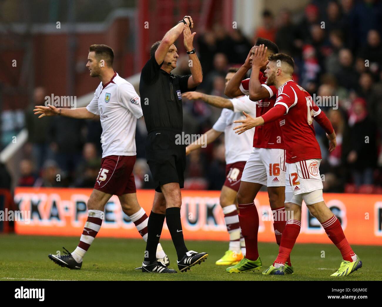 Referee Carl Boyeson signals for a Burnley penalty during the Sky Bet ...