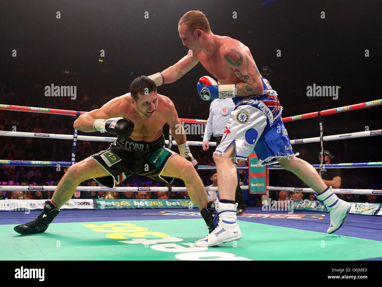 George Groves (right) and Carl Froch during the WBA and IBF Super ...