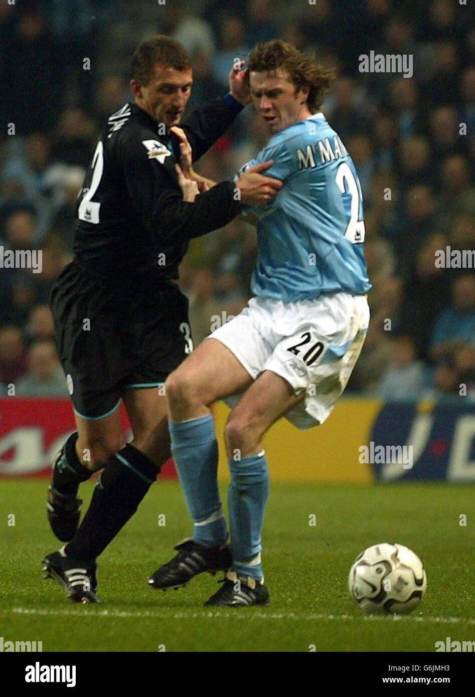 Manchester City's Steve McManaman (right) tussles with Leicester City's ...