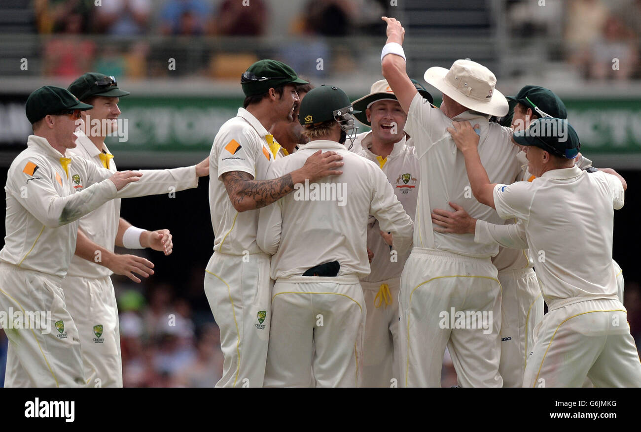 Australia celebrate after England's Alastair Cook (not pictured) is ...