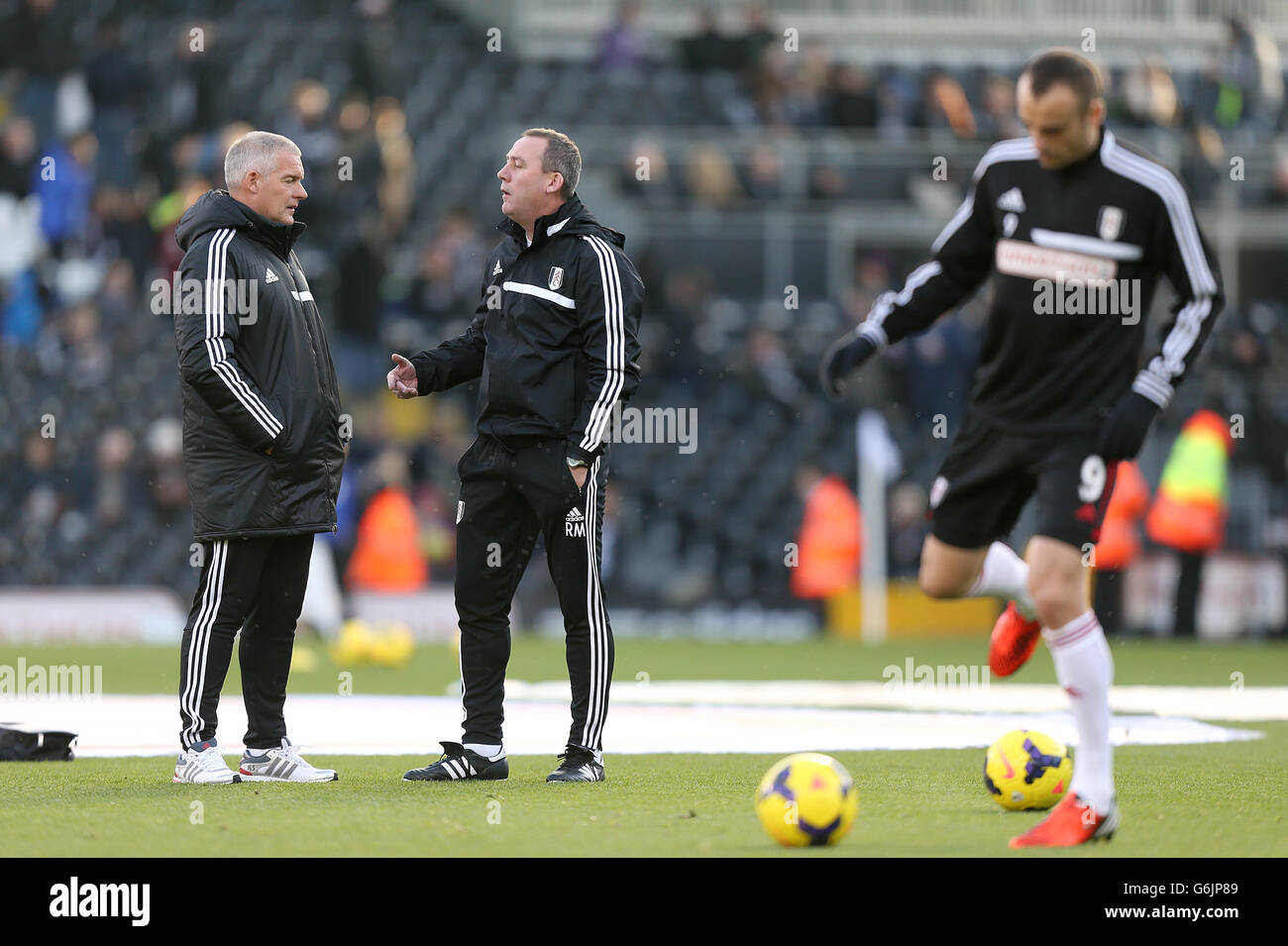 Fulham assistant manager Rene Meulensteen (centre) and goalkeeping ...