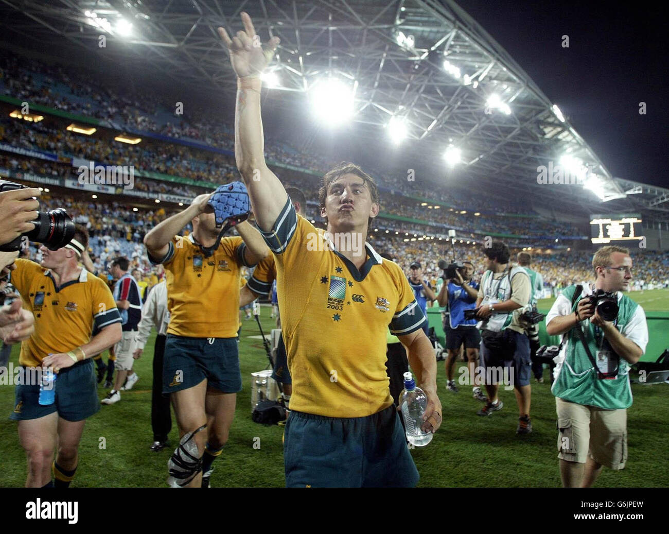 Mat Rogers salutes the crowd after Australia's 22-10 victory over New ...