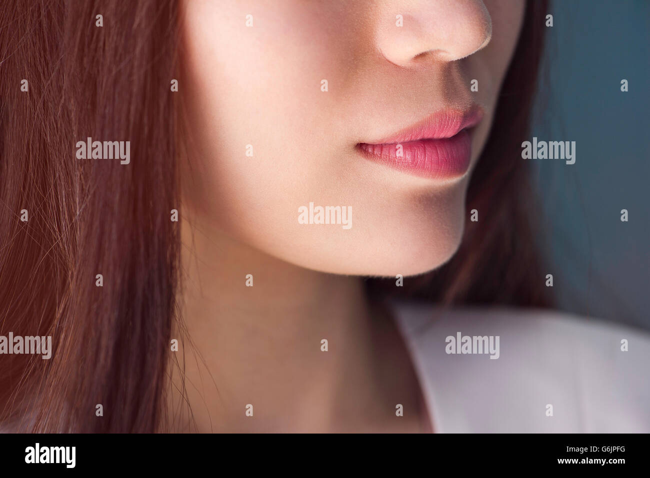 Close-up of the lower half of woman's face Stock Photo - Alamy