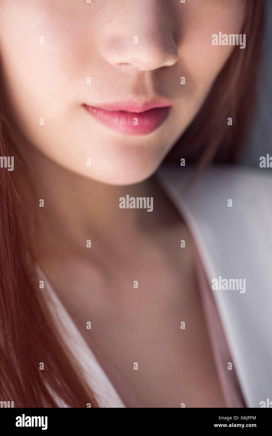 Close-up of woman's lower face Stock Photo - Alamy