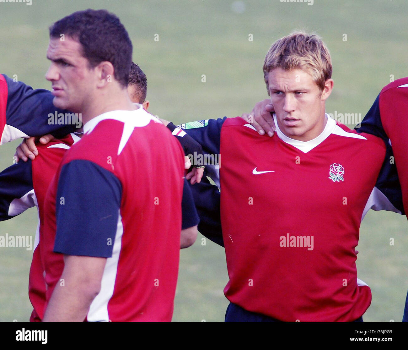 England's Jonny Wilkinson (right) with captain Martin Johnson during ...