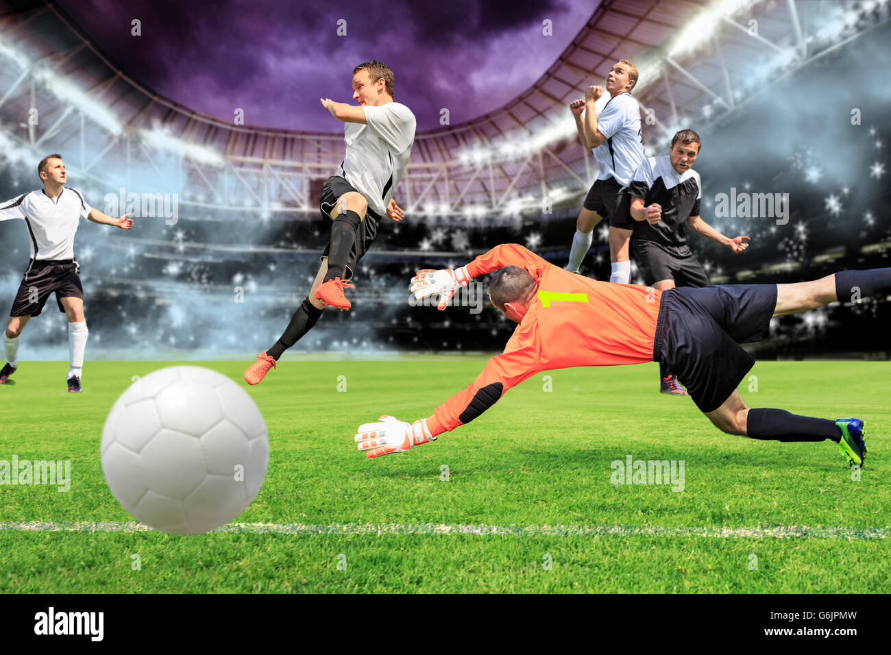 scenes from a soccer or football game with male player Stock Photo - Alamy