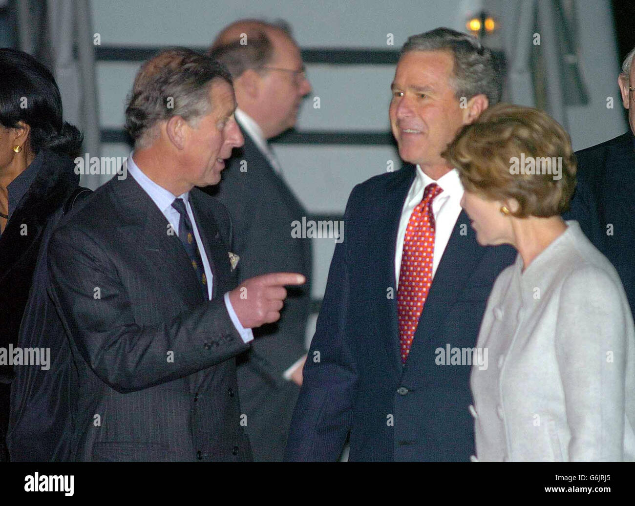 US President George Bush with his wife Laura are greeted by the Prince ...