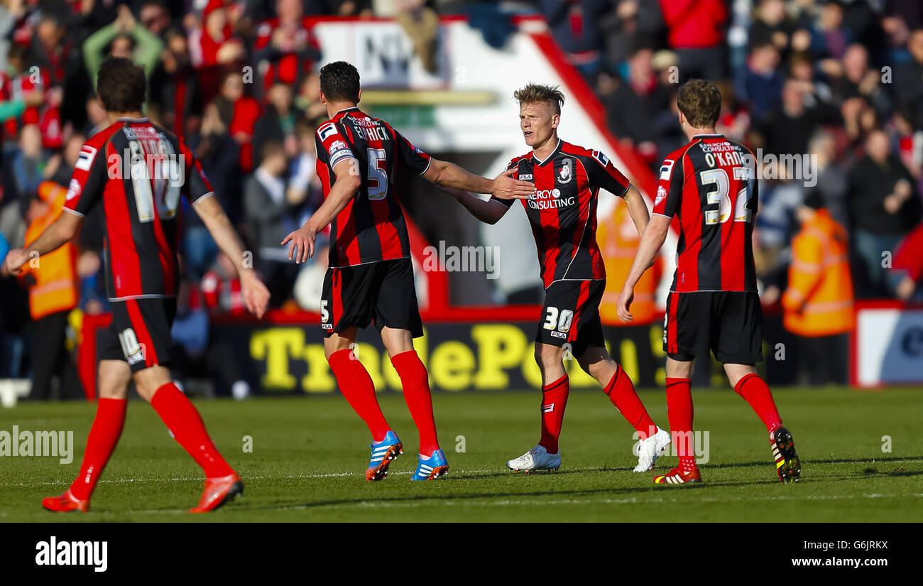 AFC Bournemouth's Matt Ritchie (second right) celebrates scoring from a ...