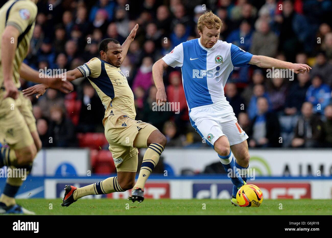 Blackburn Rovers Chris Taylor is challenged by Leeds United's Rodolph ...