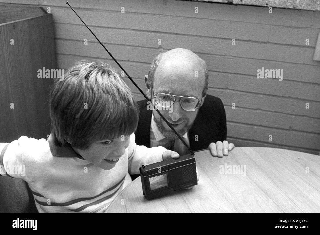 Sir Clive Sinclair, founder and chairman of Sinclair Research, watches ...