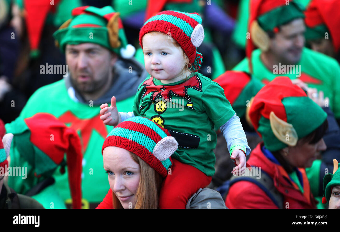 People dressed as Elves take part in the Guinness World Record for the ...