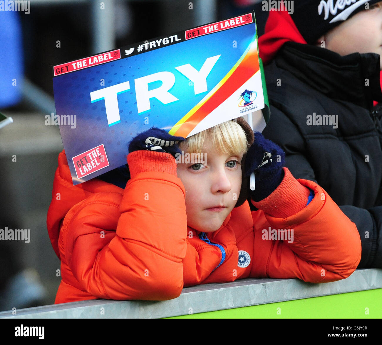 Young fan waits kick off 2013 world cup match shay hi-res stock ...
