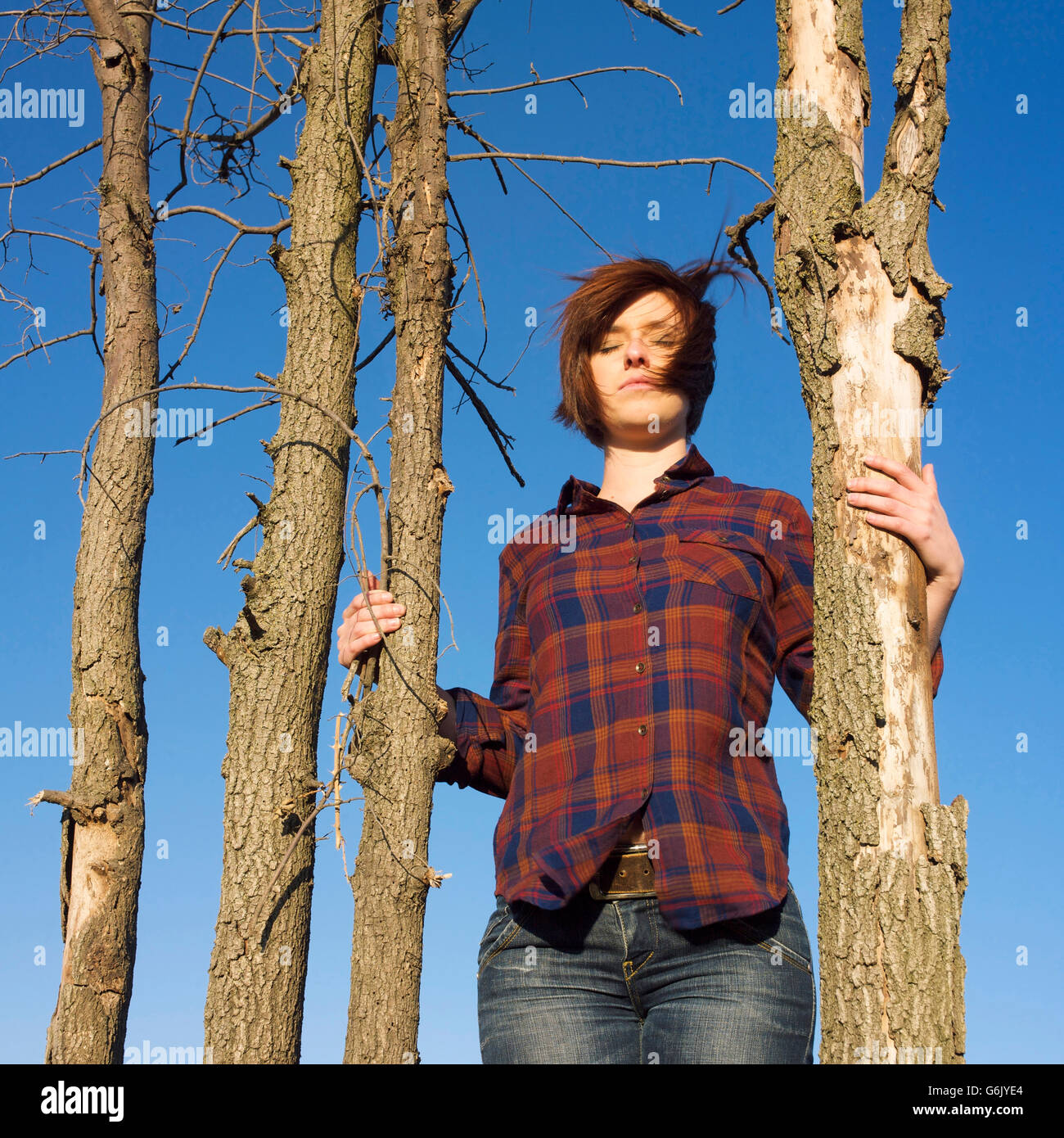 Young woman in communion with nature Stock Photo - Alamy