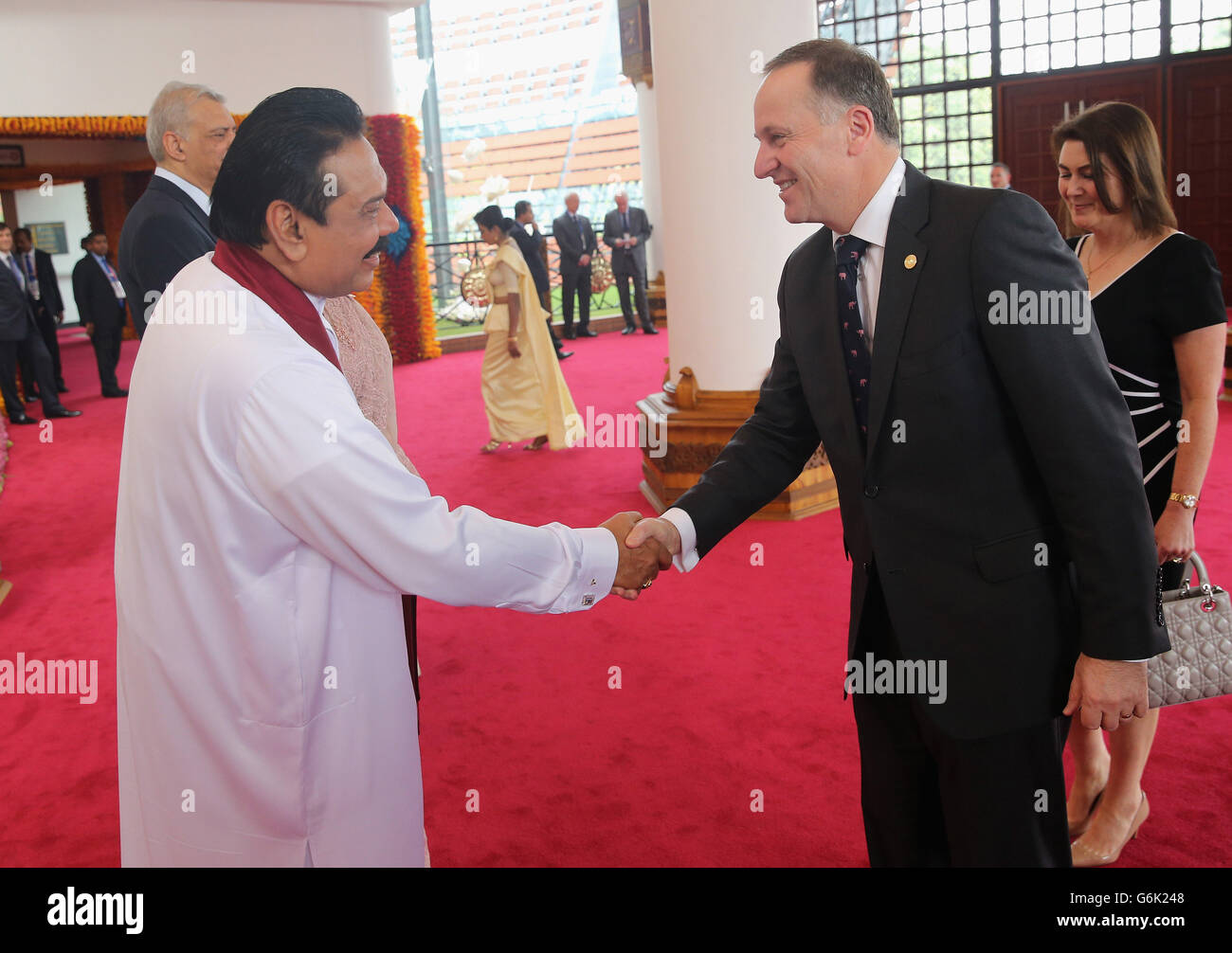 New Zealand Prime Minister John Key is greeted by President Mahinda ...