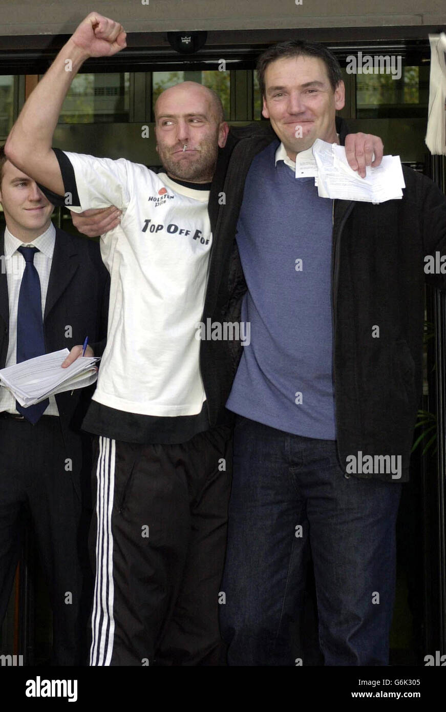 David Chick (left), 36, celebrates with a friend after having been ...