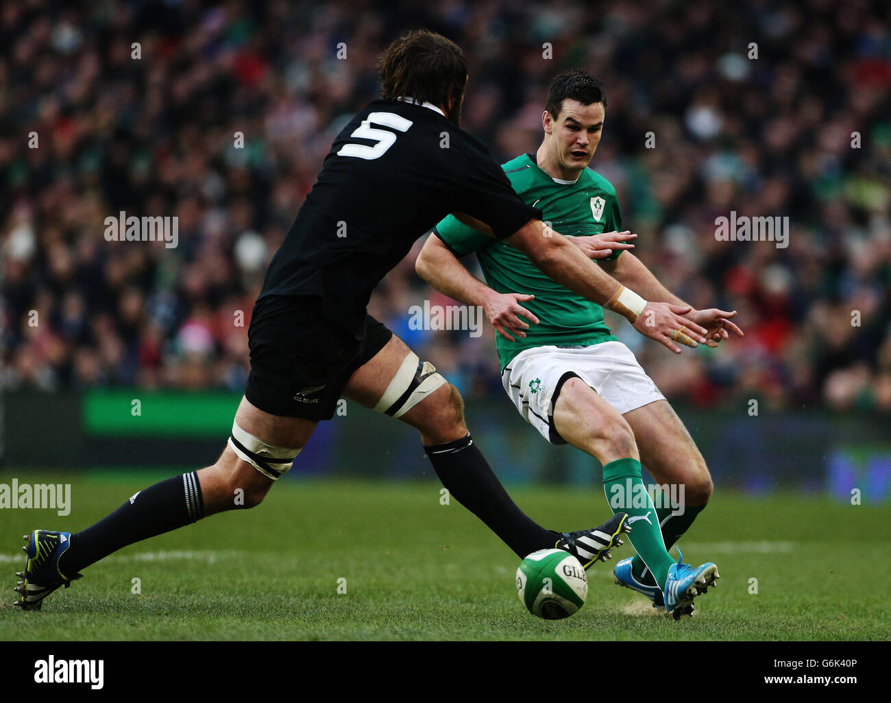 Ireland's Jonathan Sexton (right) and New Zealand's Sam Whitelock ...