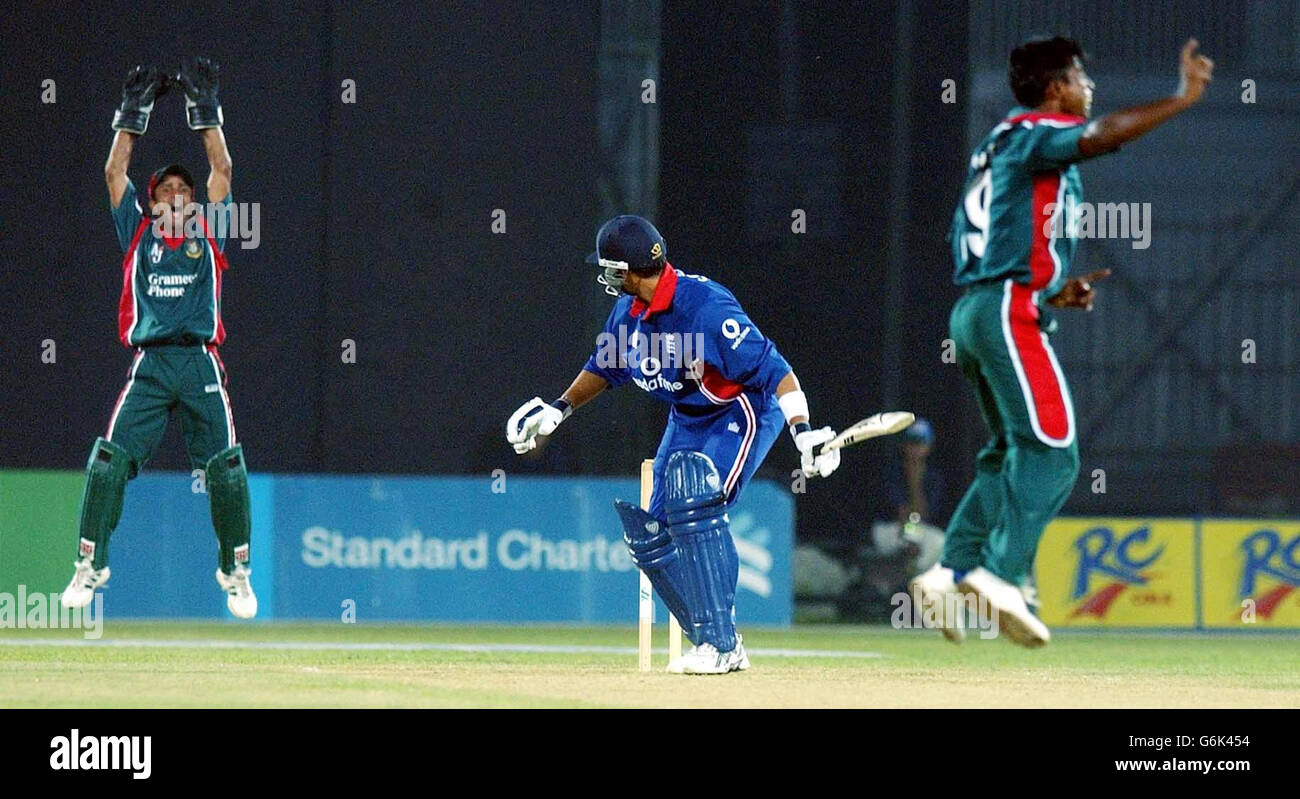 England batsman Vikram Solanki (centre) is trapped lbw by Bangladesh's ...