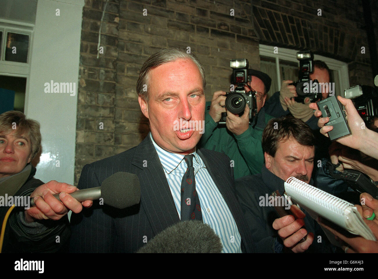 Environment minister, Tim Yeo, arrives at his constituency office in ...