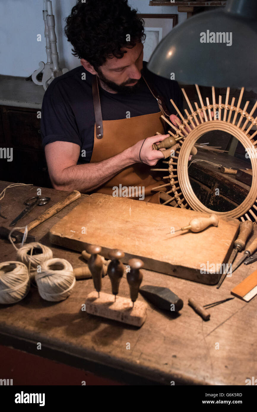 Craftsman manufacturing a mirror in his workshop Stock Photo - Alamy