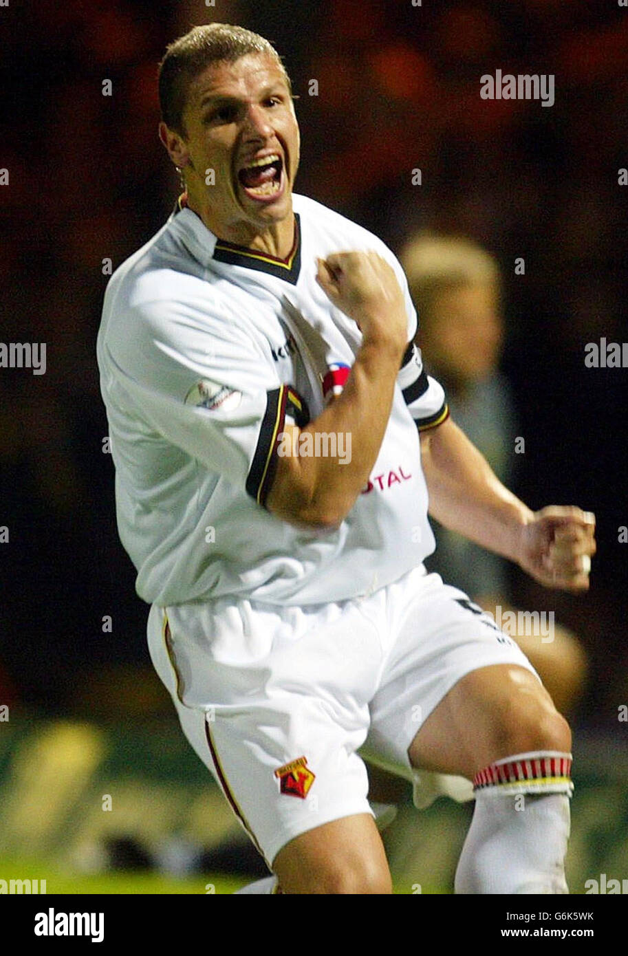 Watford captain neil cox celebrates scoring his sides second goal hi ...