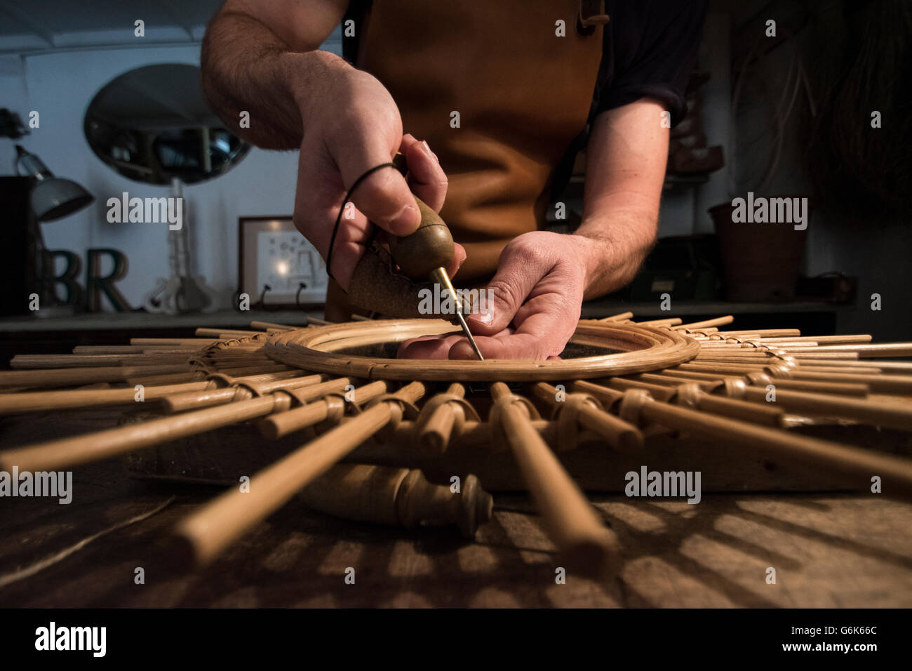 Craftsman manufacturing a mirror in his workshop Stock Photo - Alamy