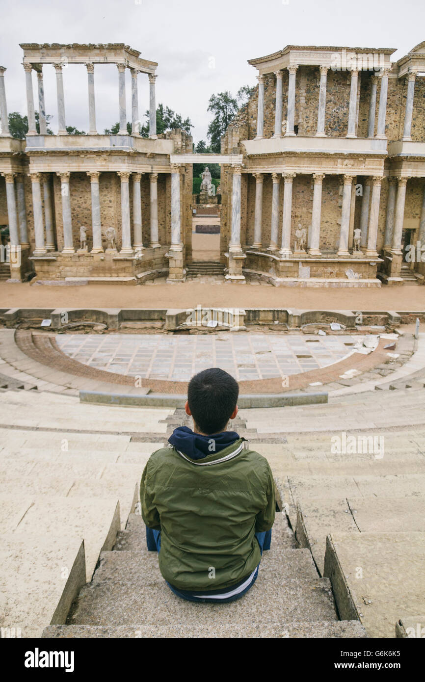 Back view man sitting in front roman hi-res stock photography and ...