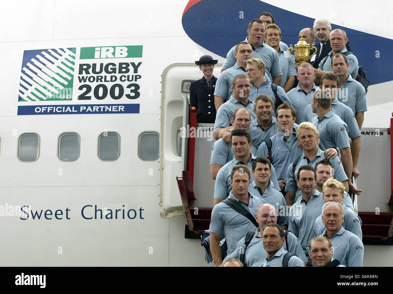 The England rugby squad pose for a photograph with the World Cup at ...