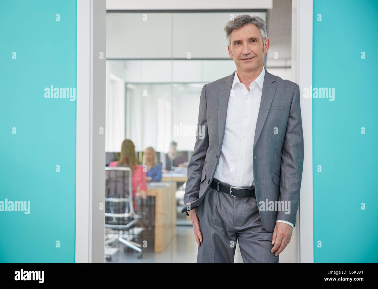 Mature manager in office Stock Photo - Alamy